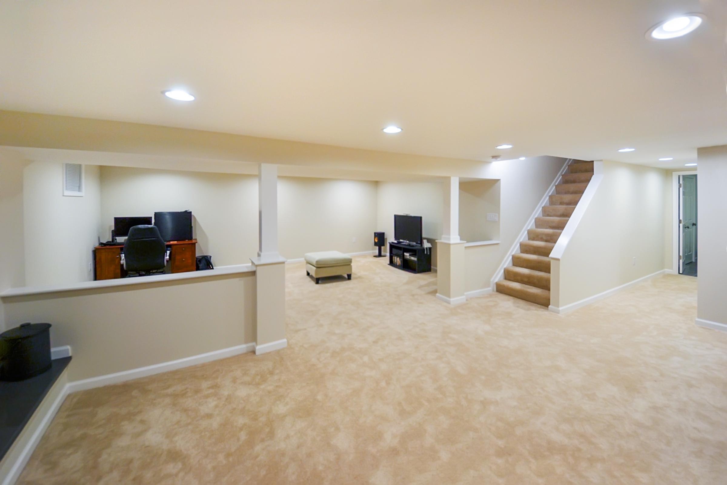Basement Finishing With Columns And Hidden LED Lights