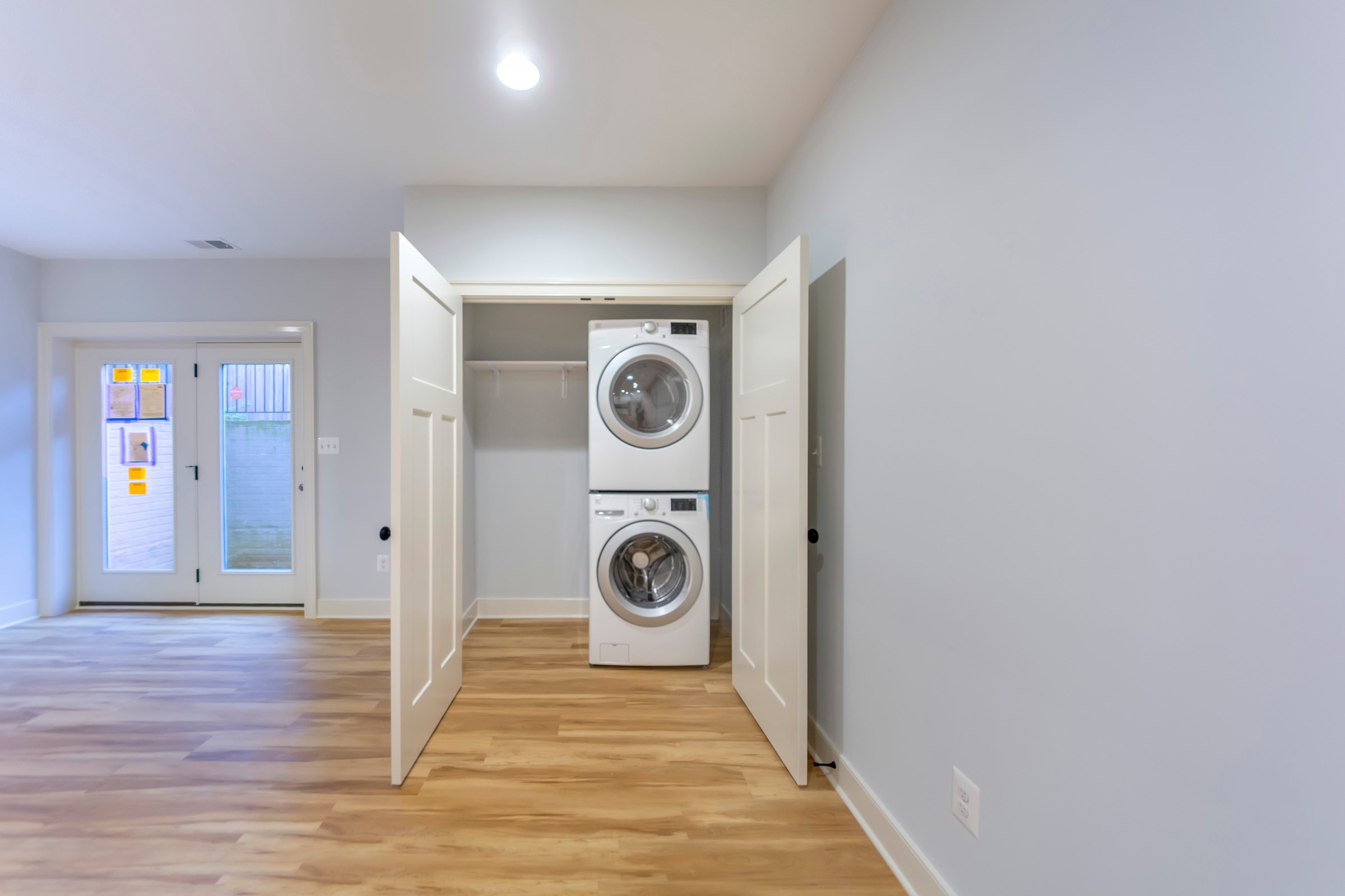 Basement Renovation - Hidden Lighting Features, Double Glass Doors