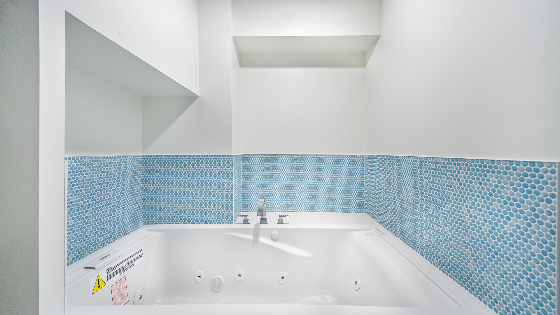 Basement Finishing with Colorful Shower and jacuzzi