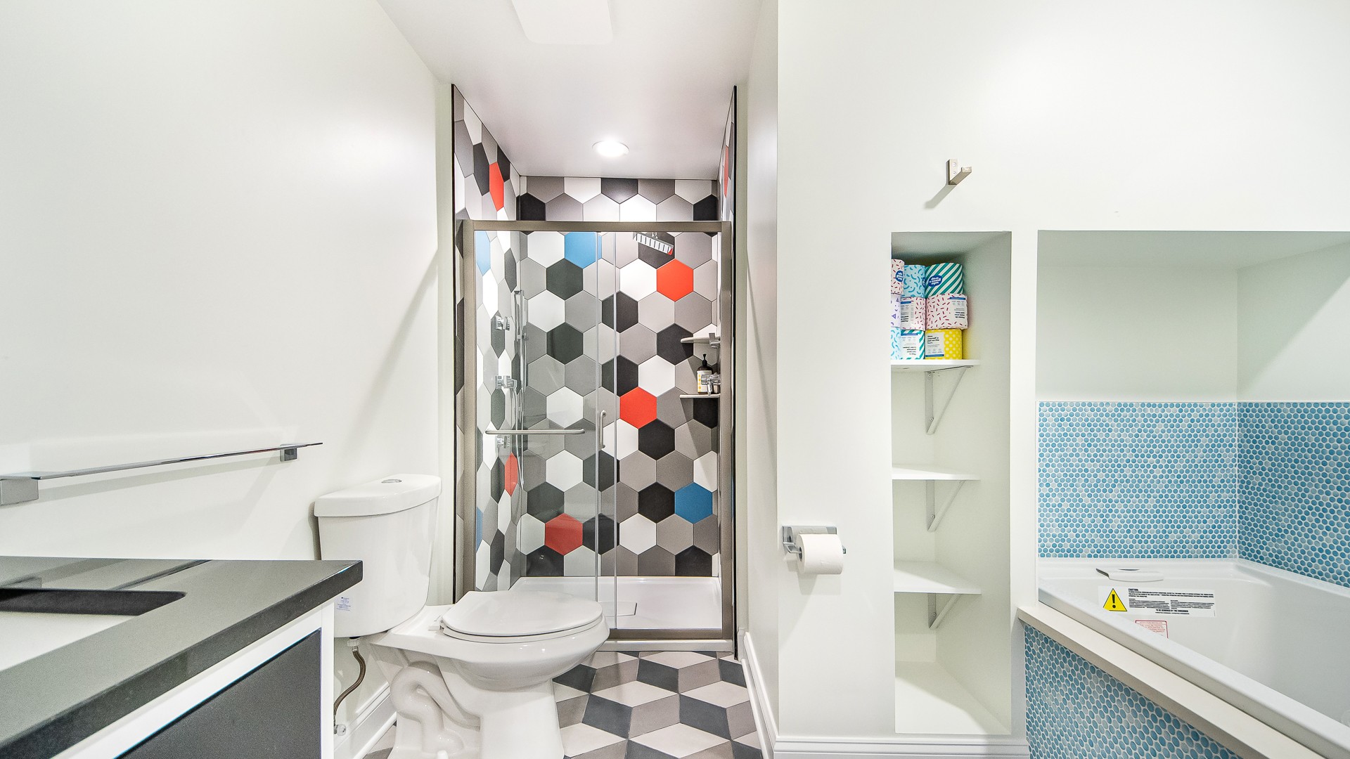 Basement Finishing with Colorful Shower and jacuzzi