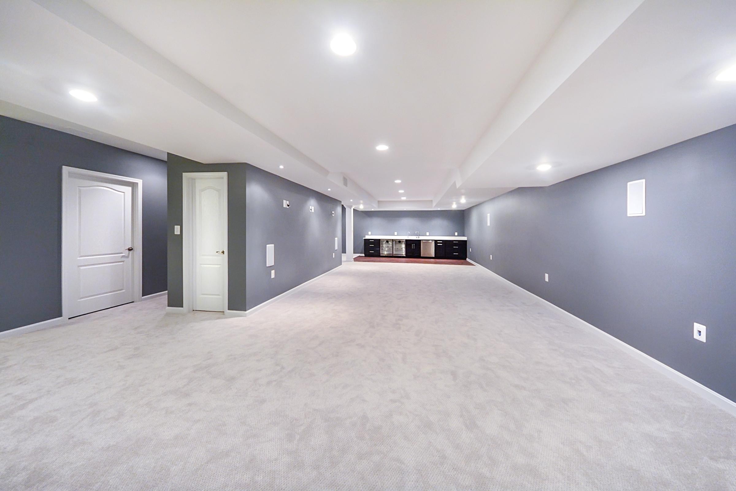Sleek Basement Design - Recessed Ceiling, LVT Planking