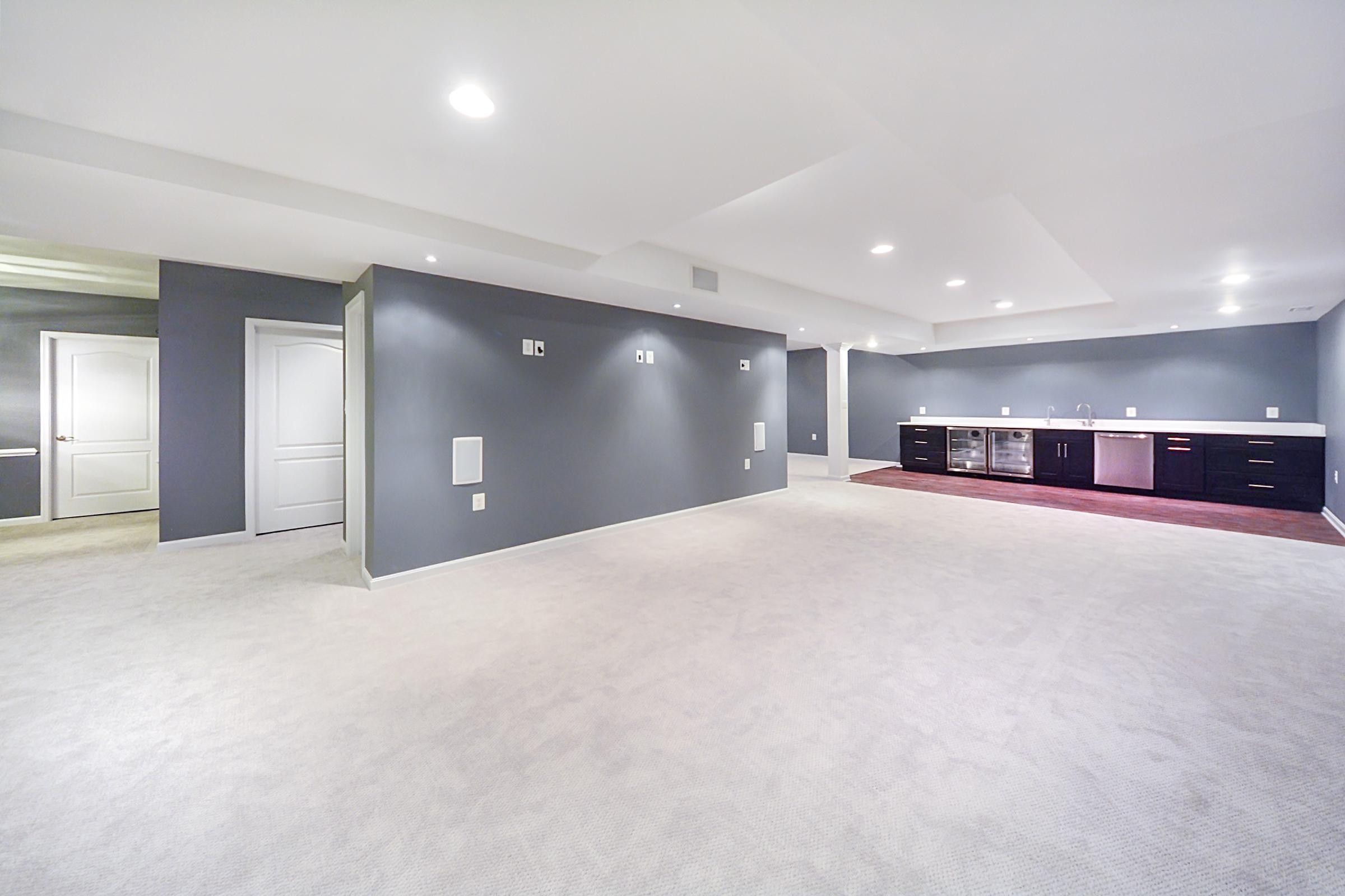 Sleek Basement Design - Recessed Ceiling, LVT Planking