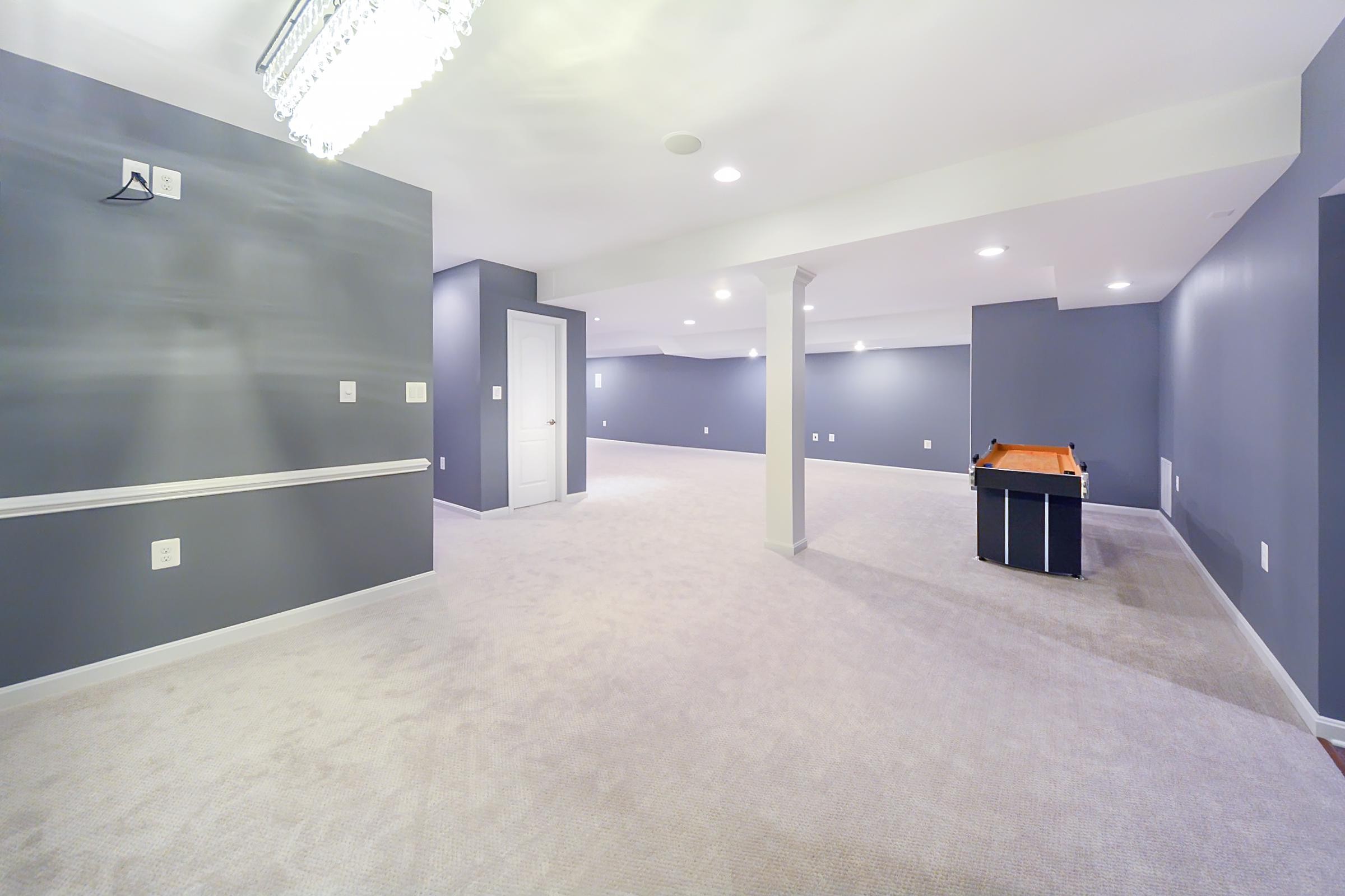 Sleek Basement Design - Recessed Ceiling, LVT Planking