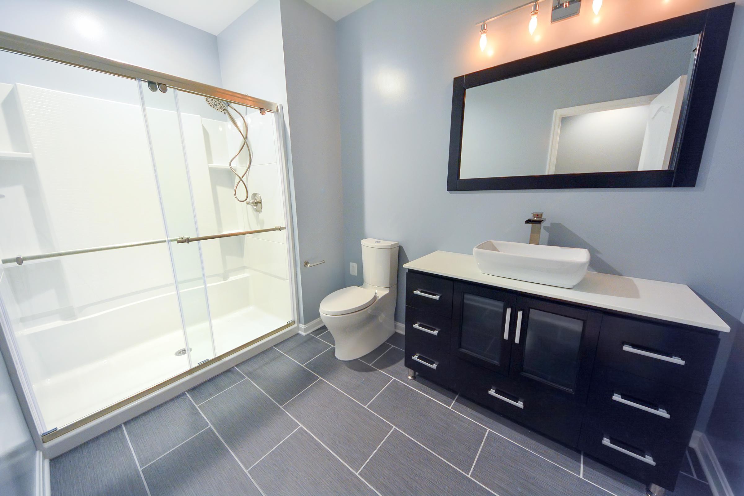 Sleek Basement Design - Recessed Ceiling, LVT Planking